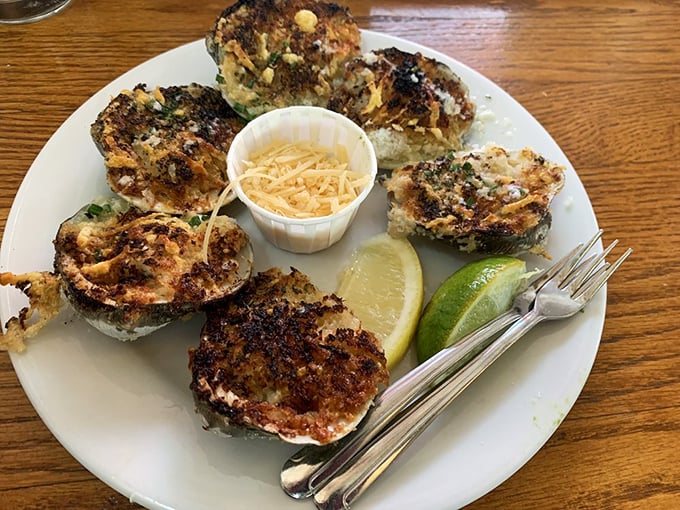 These baked clams aren't just appetizers—they're little seafood amphitheaters where butter and garlic perform their greatest hits.