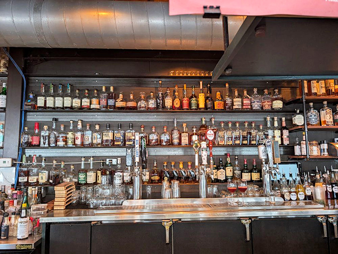 The bar shelves tell a story of possibilities. Like a library where all the books are guaranteed happy endings.
