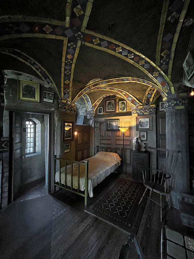 This bedroom's tiled ceiling arches like a kaleidoscopic night sky, proving concrete can create spaces of unexpected intimacy and warmth.