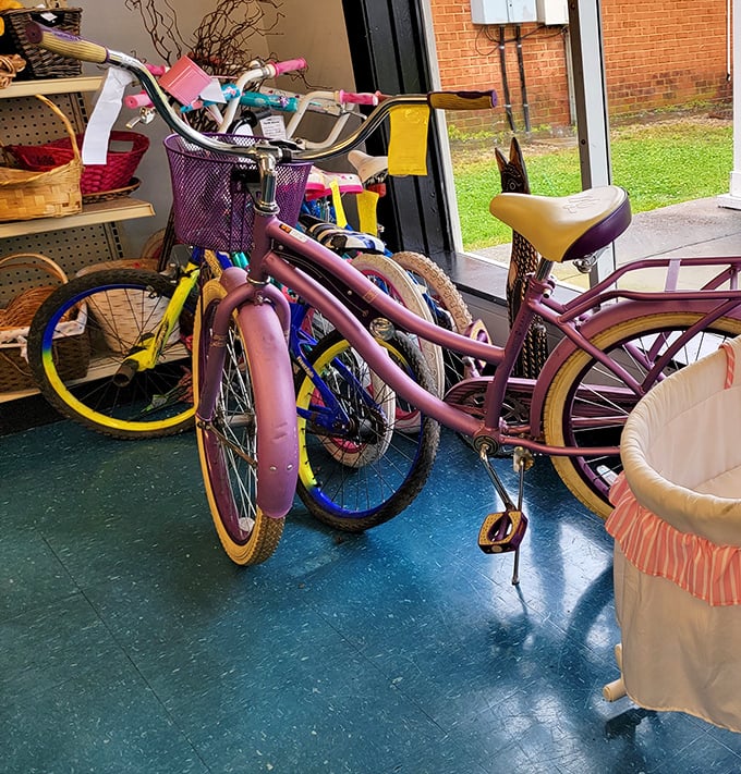 Bicycles in various shades of childhood joy. That pink cruiser isn't just transportation—it's someone's future favorite memory waiting to happen.