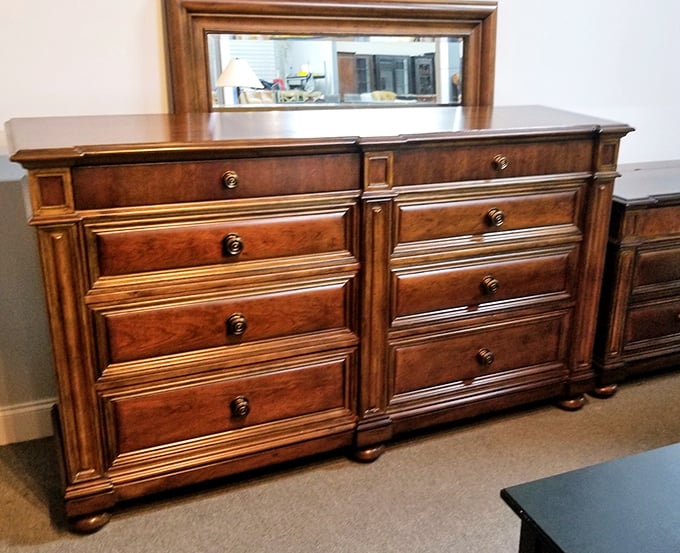 This isn't just a dresser—it's a mahogany masterpiece with drawers deep enough to hide Christmas presents or that chocolate stash you're not sharing with anyone.