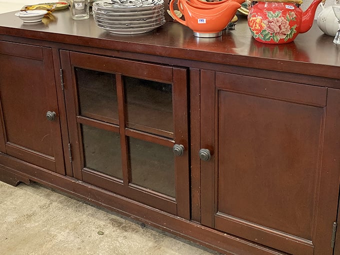 This isn't just a cabinet—it's a mahogany time machine waiting to transport someone's china collection to its next chapter.