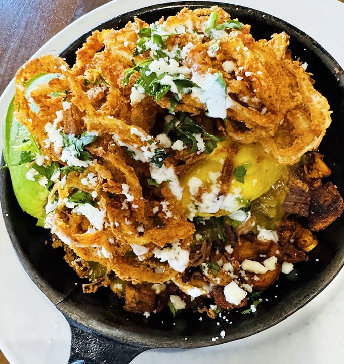 This carnitas hash isn't messing around—it's what happens when Mexican flavors crash the breakfast party and everyone has a great time.