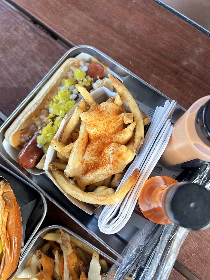 Fries smothered in cheese and beef—a dish that requires both a fork and a moment of silent appreciation before diving in.