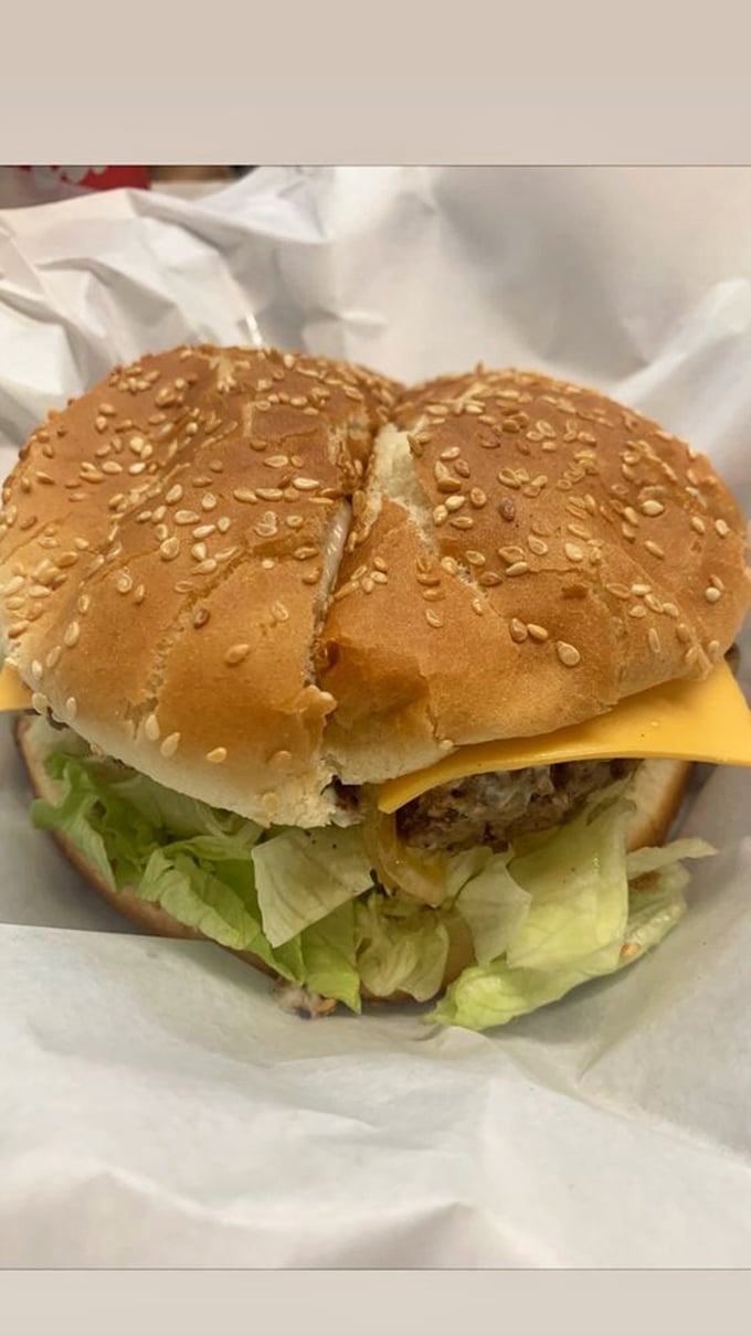 No brioche buns or artisanal nonsense here—just a proper cheeseburger with fresh lettuce that tastes like the America we all fondly remember.