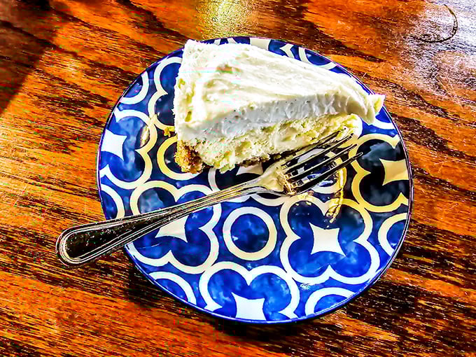 A slice of heaven on a blue patterned plate – this cheesecake doesn't need fancy frills when it's executed with such creamy, dreamy perfection.