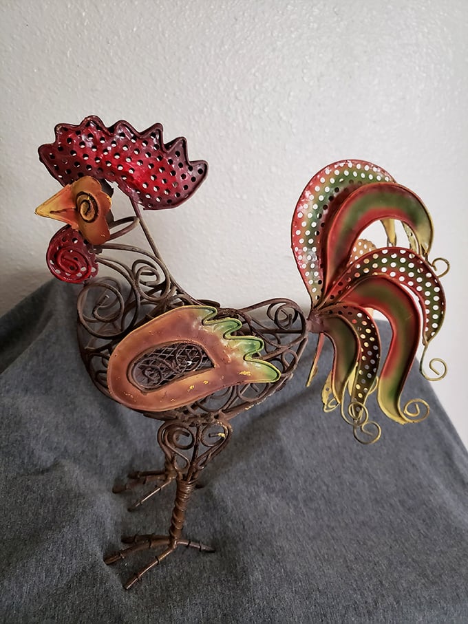This metal rooster isn't just decor—it's someone's future conversation piece waiting to strut home to a new mantel.