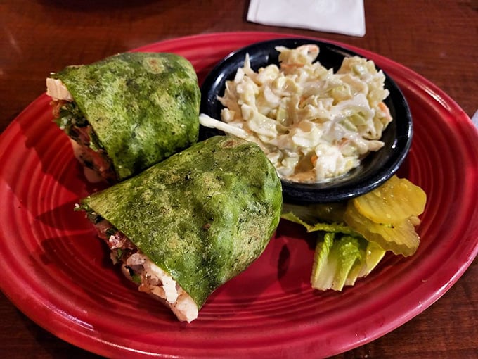 A green wrap that proves healthy options can still be indulgent – paired with creamy coleslaw for textural contrast.