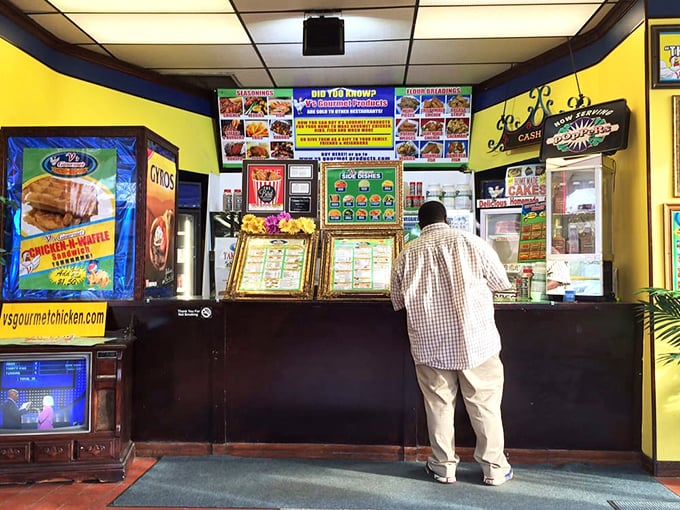 The ordering counter – where dreams are placed and fulfilled. Notice how there's no fancy digital system? Just good old-fashioned human interaction and chicken expertise.
