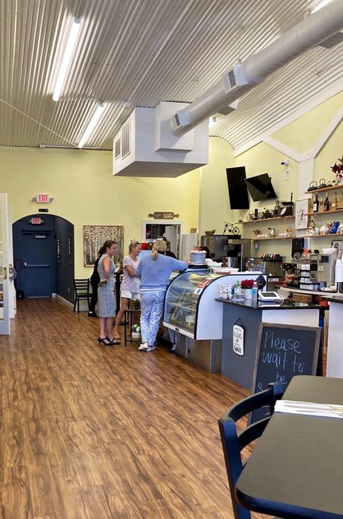 The counter area – where regulars perch on stools and staff work their breakfast magic. Some of life's greatest conversations happen across counters just like this one.