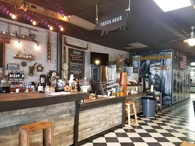The ordering counter feels like the gateway to flavor country – rustic wood, string lights, and a sign that simply says what we're all thinking: "ORDER HERE."