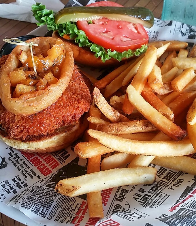 This crab cake sandwich isn't messing around – crispy exterior, tender inside, and those fries look like they're auditioning for a food magazine cover.