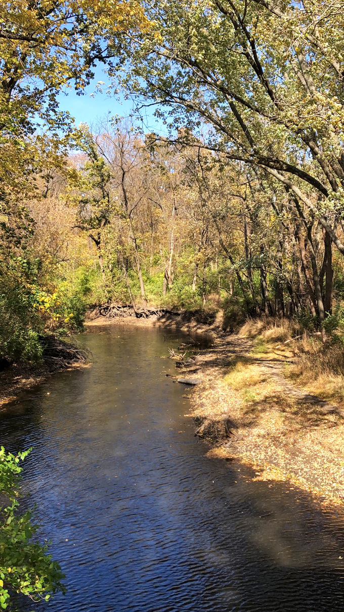 The gentle current of Sugar Creek has been flowing beneath this landmark long before anyone worried about their data plan.