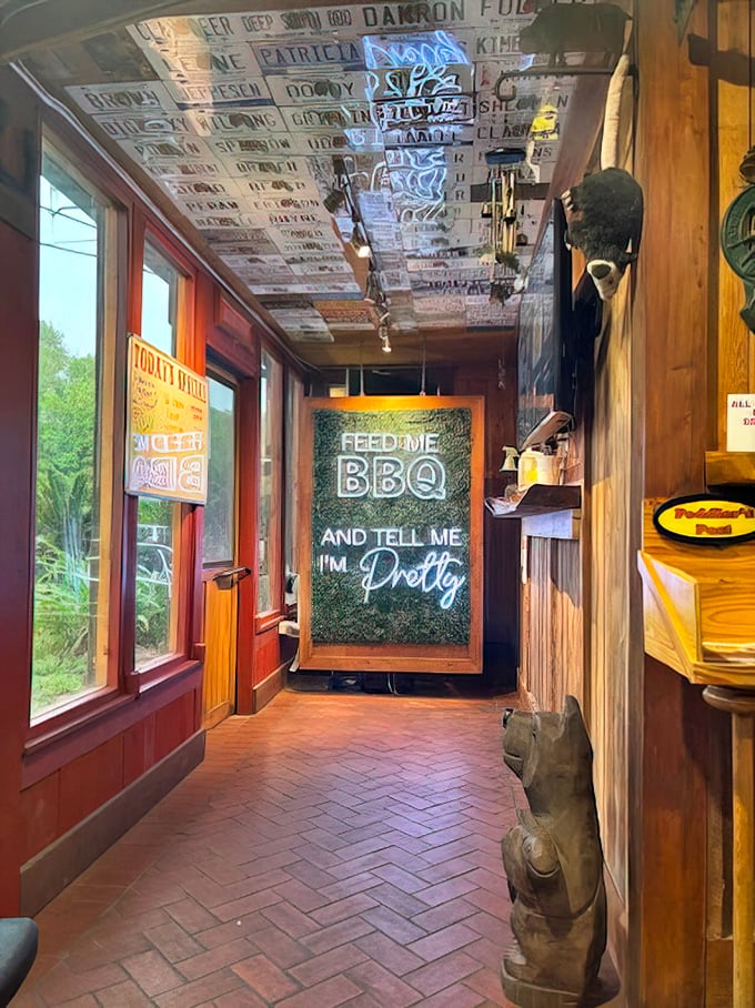"Feed me BBQ and tell me I'm pretty" – words to live by in a space where rustic charm meets unapologetic barbecue worship.