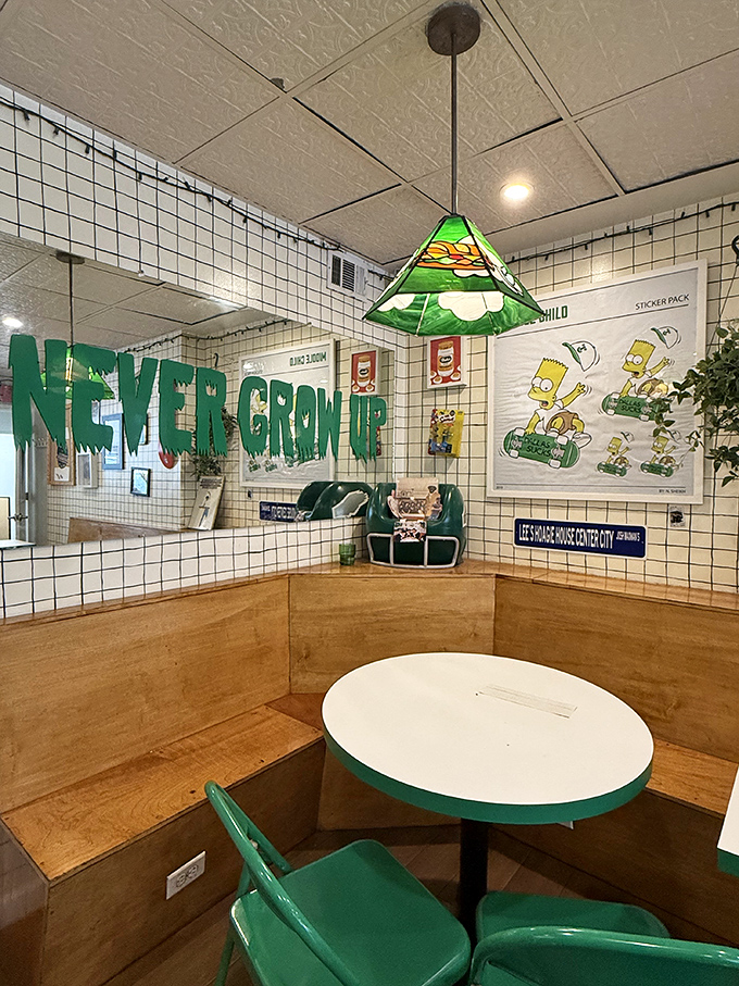The "Never Grow Up" corner—complete with Simpsons memorabilia and playful decor—where sandwich enthusiasts can embrace their inner child.
