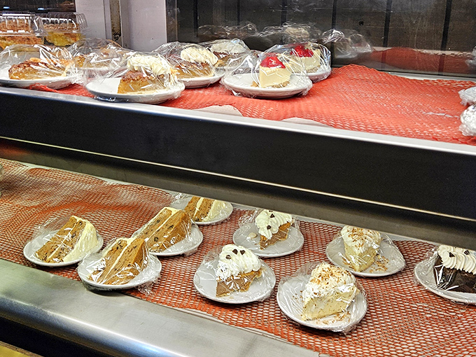 The dessert case stands as a sweet museum of Americana—each plate a sugary artifact from a time when calories weren't counted, just enjoyed.