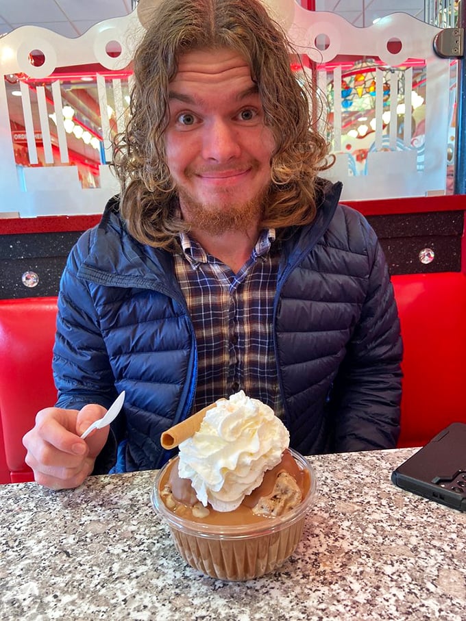 That face says it all – the universal expression of "I've found my happy place" that transcends language. Ice cream enlightenment achieved.