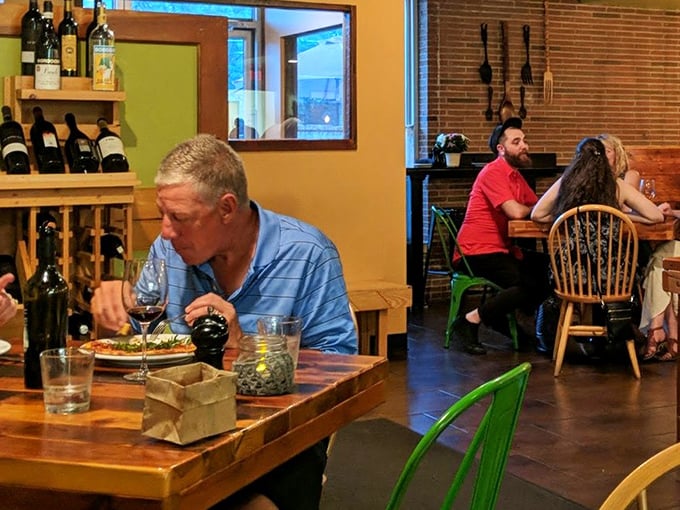 The dining room hums with that perfect restaurant energy—intimate enough for conversation, lively enough to feel like you're somewhere special.