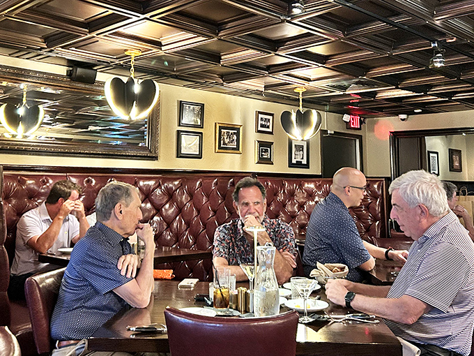 The dining room hums with the universal language of satisfaction. Conversations pause only for the next heavenly bite.