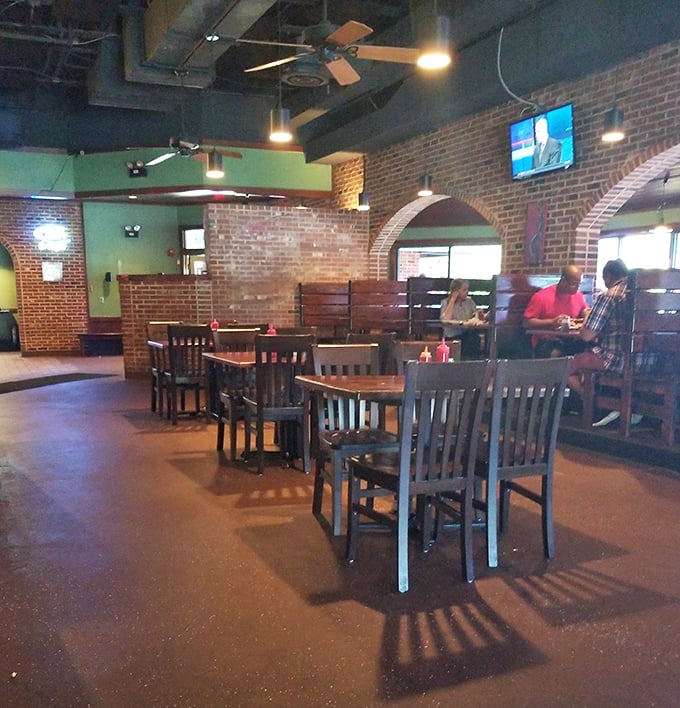 Even during quieter moments, Kiki's brick archways and wooden tables create an atmosphere where memories are made between bites of soul food.