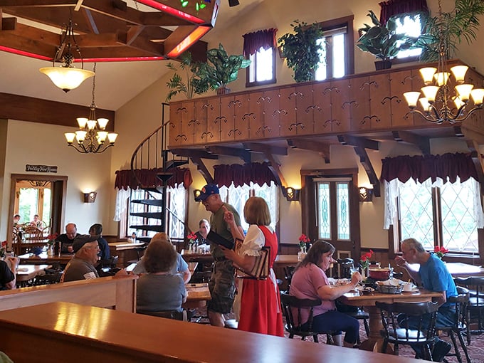 The dining area combines rustic charm with serious comfort—exactly what you need after the workout of selecting too much cheese.