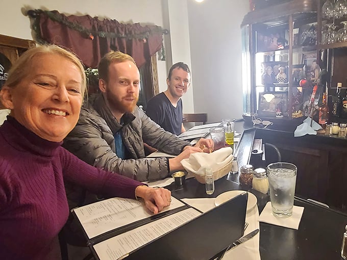 Happy diners at the bar—that moment when strangers become friends united by the universal language of good food.