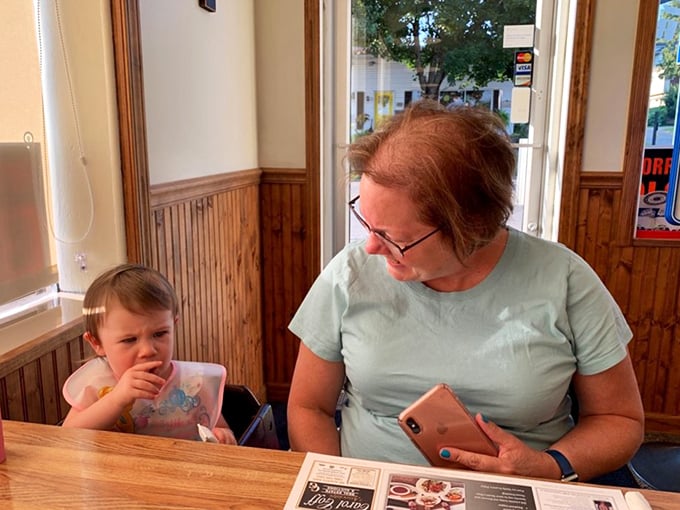 Multi-generational dining at its finest. Where else can you see smartphones and sippy cups coexisting peacefully over comfort food?
