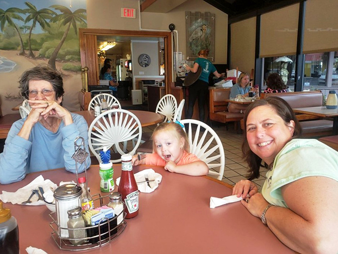 Three generations sharing breakfast and memories—the true magic of places like Dino's isn't just on the plate.