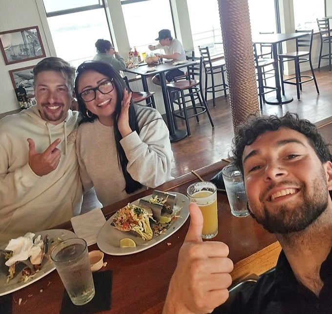 Friends raising glasses to good times – this is what social media wishes it could capture.