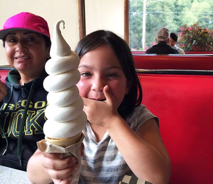 Families gather in these booths to create memories one burger at a time. The restaurant's warm atmosphere makes everyone feel like a regular.