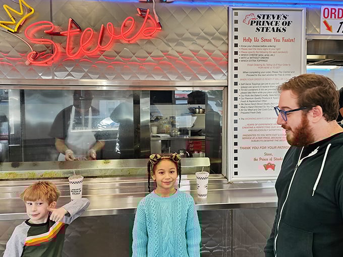 Where families gather to witness the cheesesteak ceremony—a Philadelphia tradition passed down through generations.