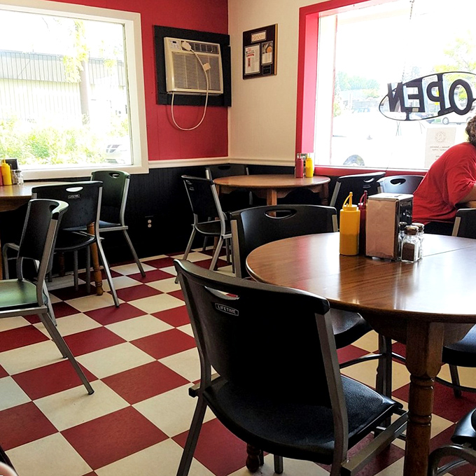 The classic red and white checkerboard floor isn't retro design—it's authentic Americana that never needed updating in the first place.