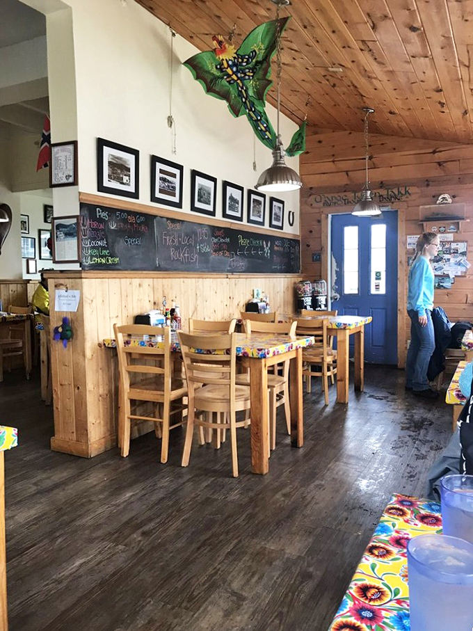 Wooden beams, colorful kites, and a chalkboard menu create the perfect backdrop for seafood feasting – casual enough to relax, special enough to remember.