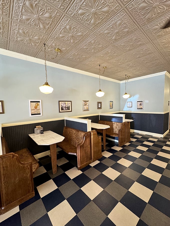 These booths aren't just seating—they're front-row tickets to memory-making, with marble tables ready to support your elbow as you contemplate that last spoonful.