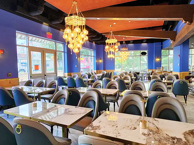 The spacious dining room, with its signature blue walls and stunning chandeliers, sets the stage for memorable meals worth crossing county lines for.