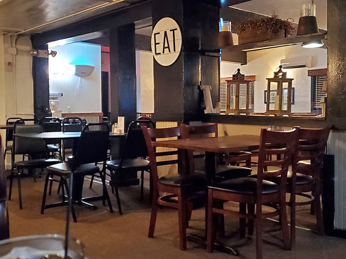 The "EAT" sign isn't just a suggestion—it's the best advice you'll get all day in this cozy corner.