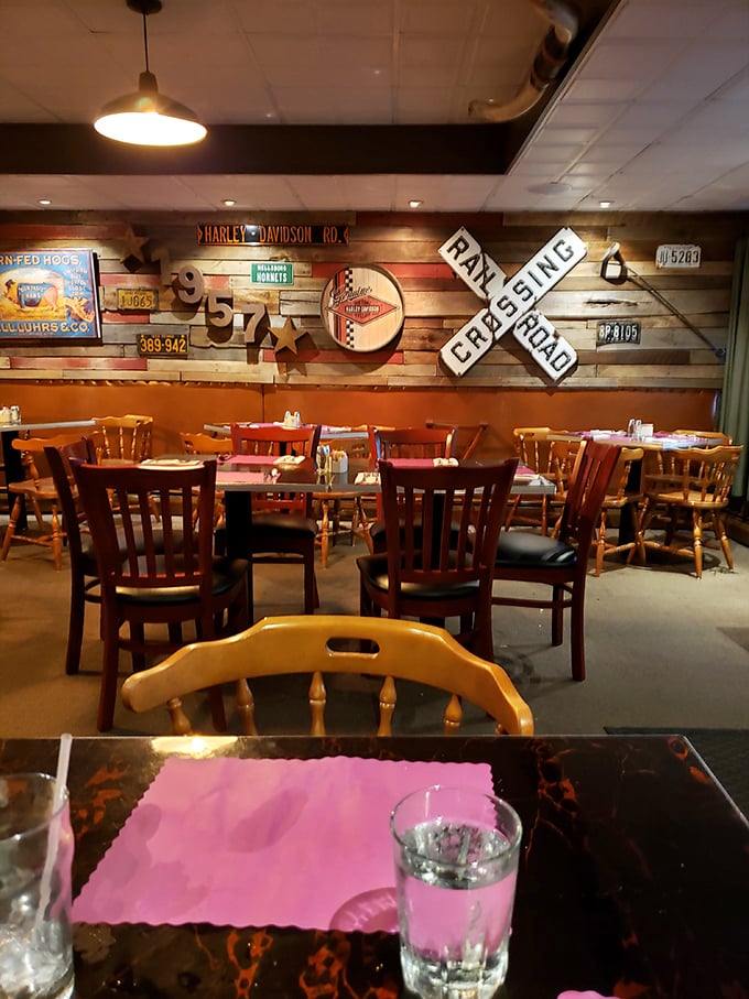 The dining room where memories are made. Those vintage signs aren't decoration—they're conversation starters between bites of perfectly cooked beef.