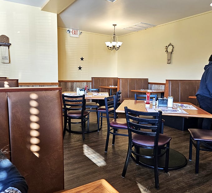Sunlight streams through windows onto polished wood and comfortable booths – the stage is set for memorable meals and conversations.