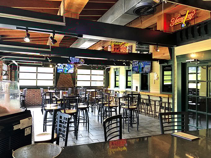 Where beer signs glow and hunger goes to surrender. This dining room has seen more happy faces than a lottery winner's family reunion.