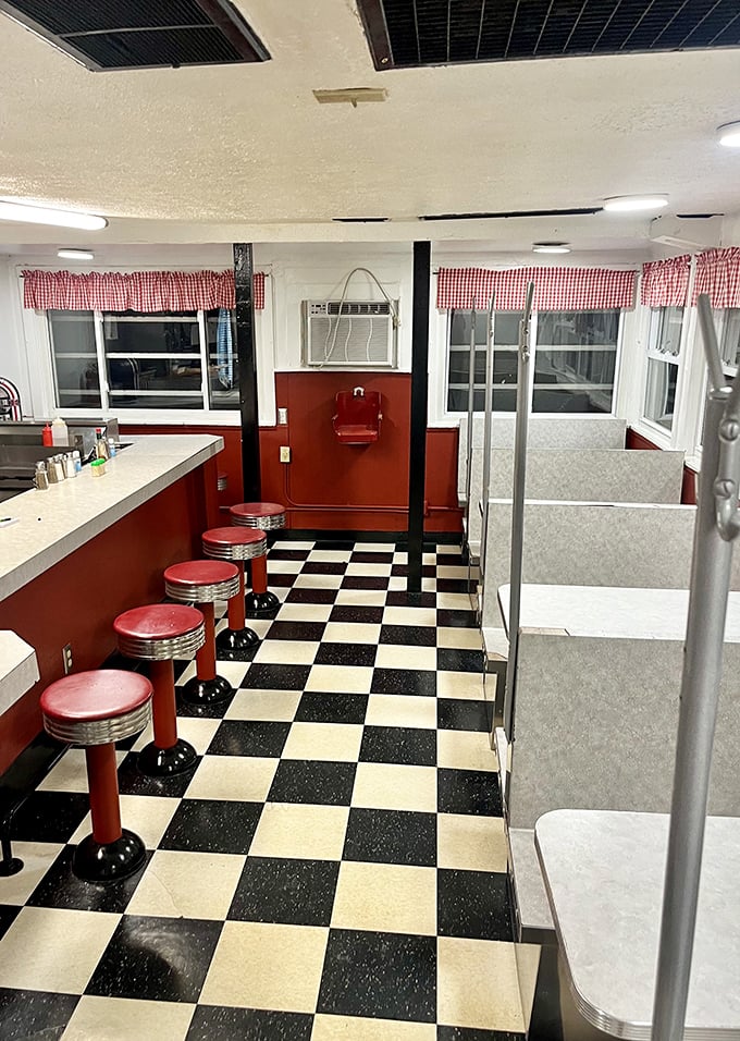 The classic black and white checkered floor isn't retro by design—it's authentic by survival, outlasting countless food trends.