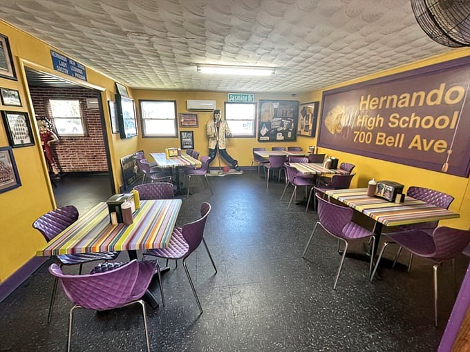 Purple chairs and yellow walls create a dining room that's part high school spirit, part time machine – comfort food deserves comfortable surroundings.