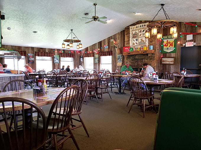 Wood-paneled warmth and wagon wheel chandeliers create the dining room equivalent of a bear hug from an old friend.