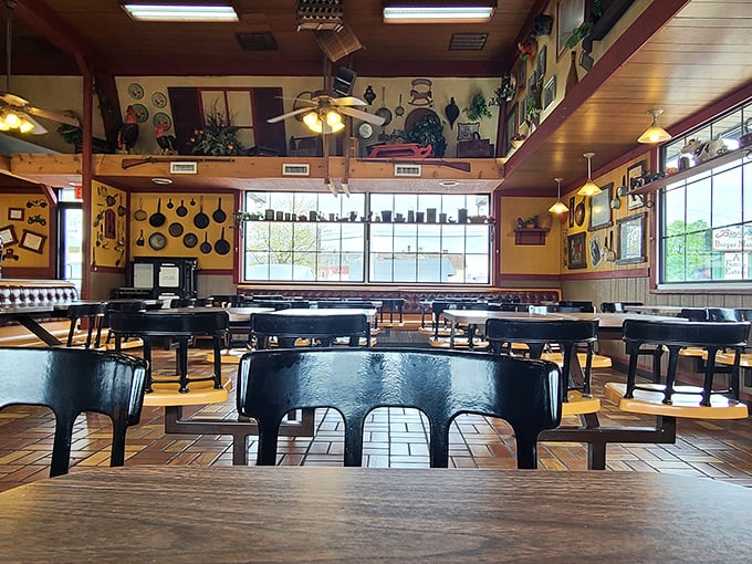 The dining room's warm wood tones and eclectic wall decorations create an atmosphere where time slows down and conversations flow as easily as the coffee.