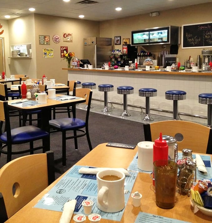 The counter view—where coffee mugs, condiment caddies, and the promise of friendly banter create the quintessential diner experience.