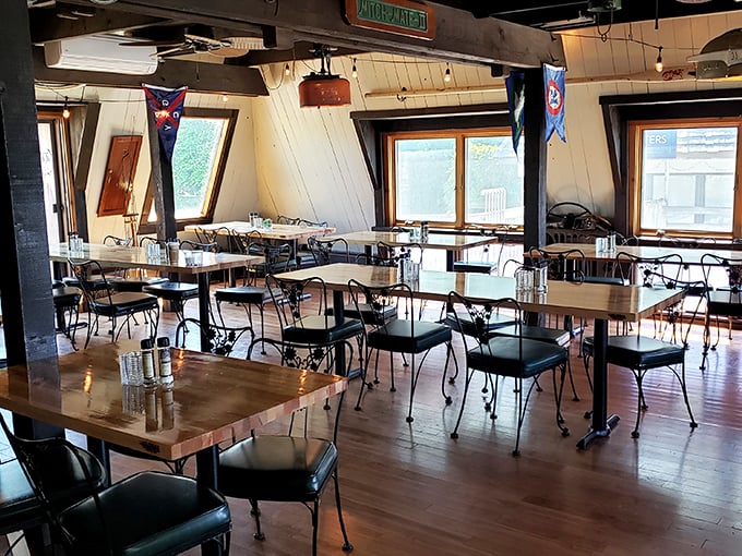 Sunlight streams through angled windows onto wooden tables where countless "remember when" conversations have unfolded. Pure Michigan dining at its finest.