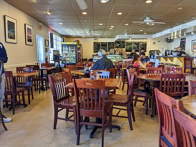 The dining area hums with conversation and caffeine-fueled energy. These wooden chairs have witnessed countless first dates, business deals, and Sunday family gatherings.