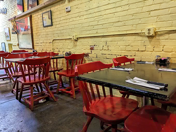 Red chairs against cream walls—a dining room that feels like your coolest friend's kitchen, if your friend happened to be an amazing Italian chef.
