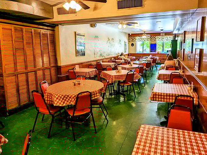 The dining room at Meloni's doesn't follow design trends—it sets the standard for what a proper Italian-American restaurant should feel like.