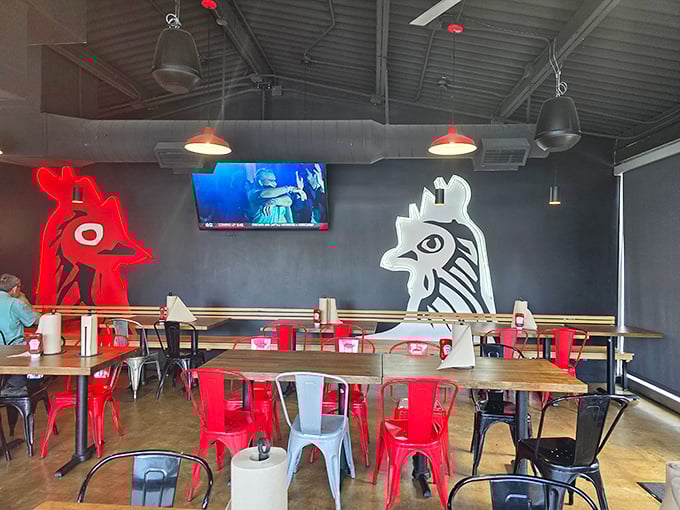Those red and white chicken silhouettes aren't just decor—they're sentinels watching over diners brave enough to test their spice tolerance.