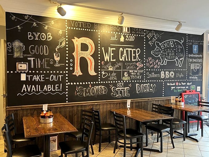 The chalkboard wall isn't just decoration – it's a manifesto of BBQ philosophy, complete with the magic words "BYOB" that make adults smile.